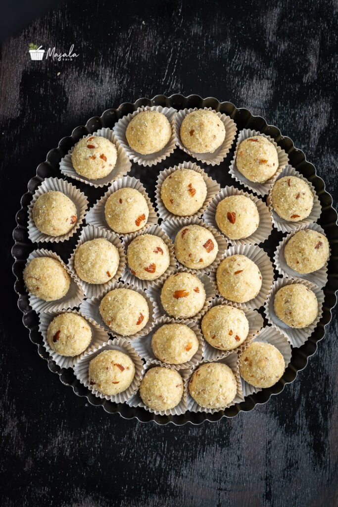 Coconut Rava Laddu | Suji Rava Ladoo Recipe with Coconut - Masalakorb